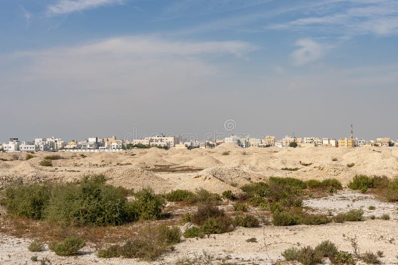 Bahrain - a Ali - Dilmun Tombs and Urban Contrast Stock Photo - Image ...