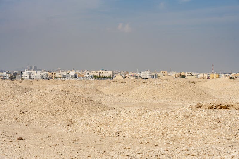 Bahrain - a Ali - Dilmun Tombs and Urban Contrast Stock Image - Image ...