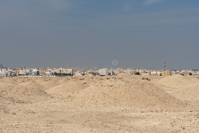 Bahrain - a Ali - Dilmun Tombs and Urban Contrast Stock Image - Image ...