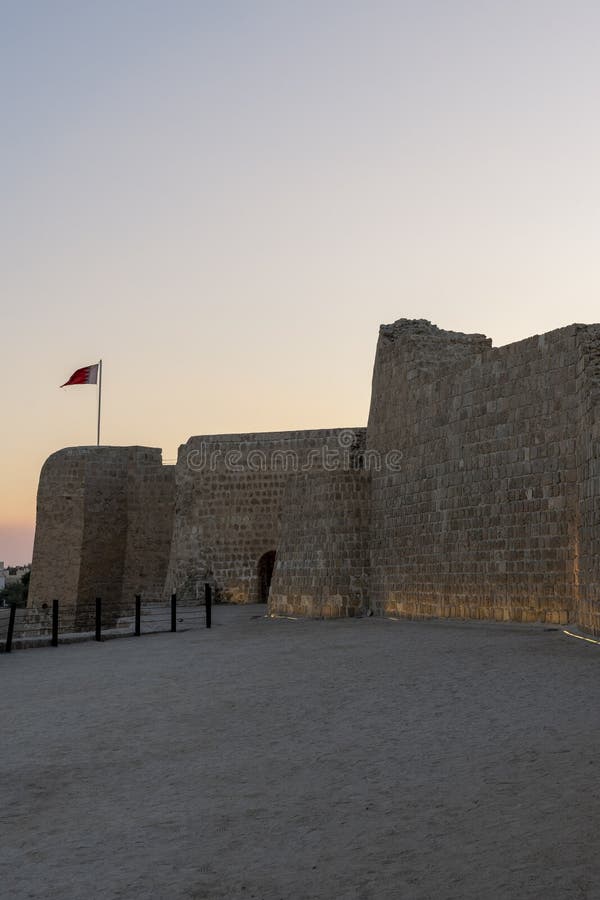 Bahrain - Manama - Qalat Al Bahrain Fort Stock Photo - Image of dusk ...
