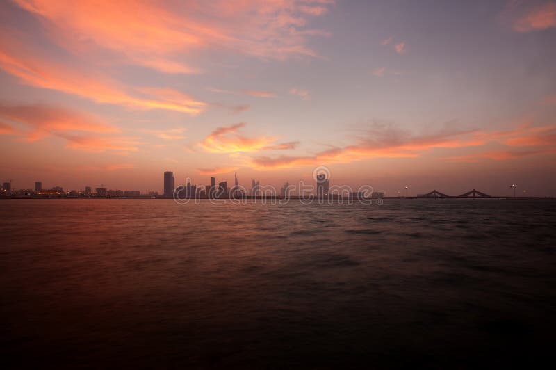 Bahrain Skyline and Beautiful Clouds during Sunset Stock Photo - Image ...