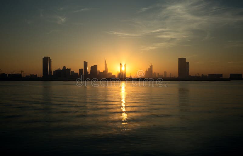 Bahrain Skyline and the Sun during Dusk Stock Image - Image of bahrain ...