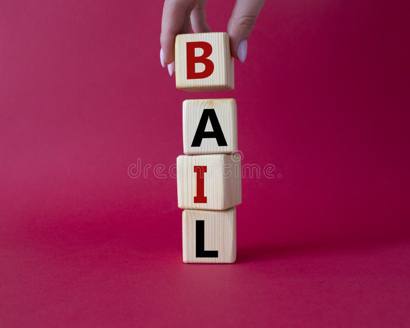 Bail Symbol Concept Word Bail On Wooden Cubes Businessman Hand