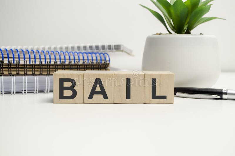 BAIL Word Made with Wooden Blocks and Notepads Stock Image - Image of ...