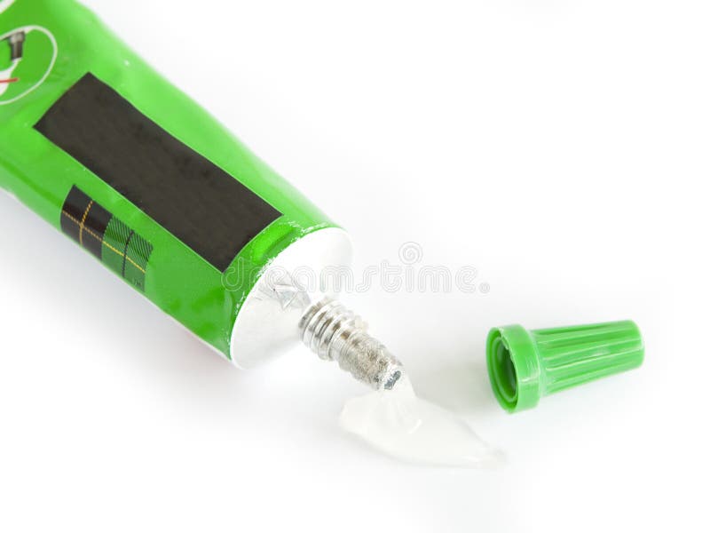 Un tube de colle liquide photo stock. Image du matériel - 56824956