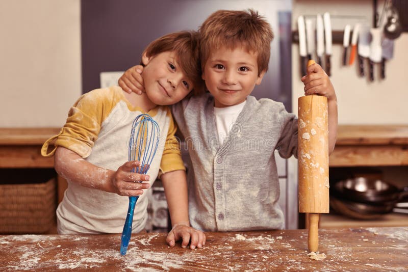 We Bake As a Team. Cropped Shot of Two Young Brothers Baking in the ...