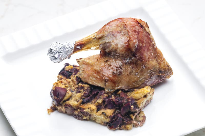 Bake Poultry Leg Served with Stuffing with Red Beans Stock Image ...
