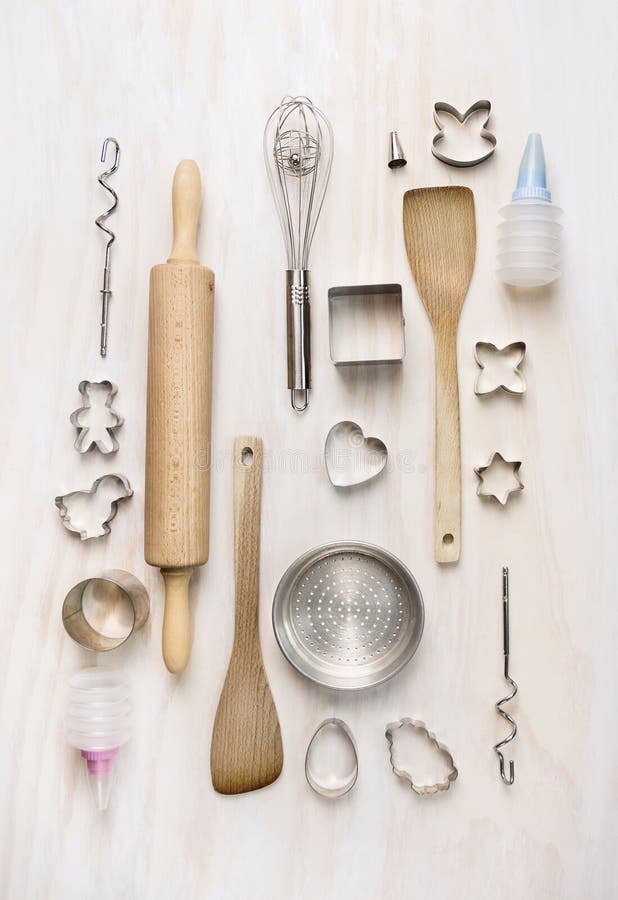 Easter Bake Tools with Quail Eggs and Biscuit Cutter on White Wooden ...