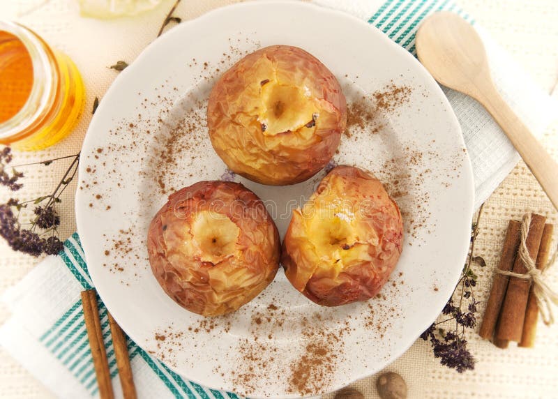 Baked Apples in White Plate on Table. Top View. Stock Image - Image of ...