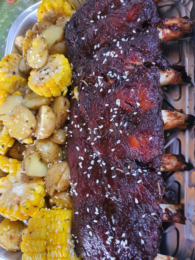 Baked Baby Back with Sidings Stock Photo - Image of back, babypotatoes ...