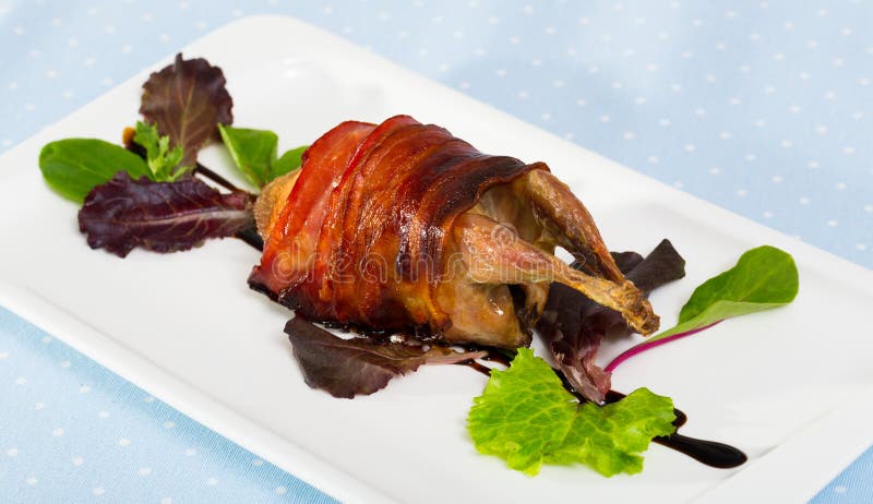 Baked in Bacon Small Quail with Balsamic Sauce, Served with Lettuce ...