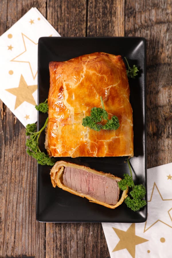 Baked beef with dough stock photo. Image of cooked, table - 124427614