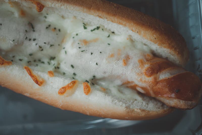 Baked Bread Hot Dog With Cheese Stock Photo - Image of melted, light ...