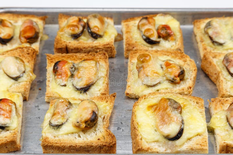 Baked Bread with Mussel and Cheese Stock Photo - Image of snack ...