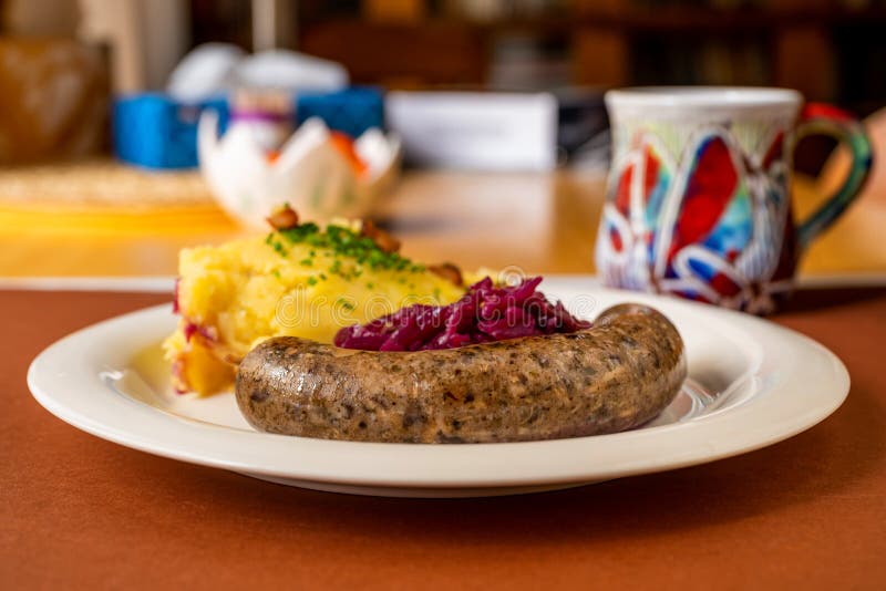 Baked Bright Pudding Sausage with Mashed Potato and Red Cabbage on ...