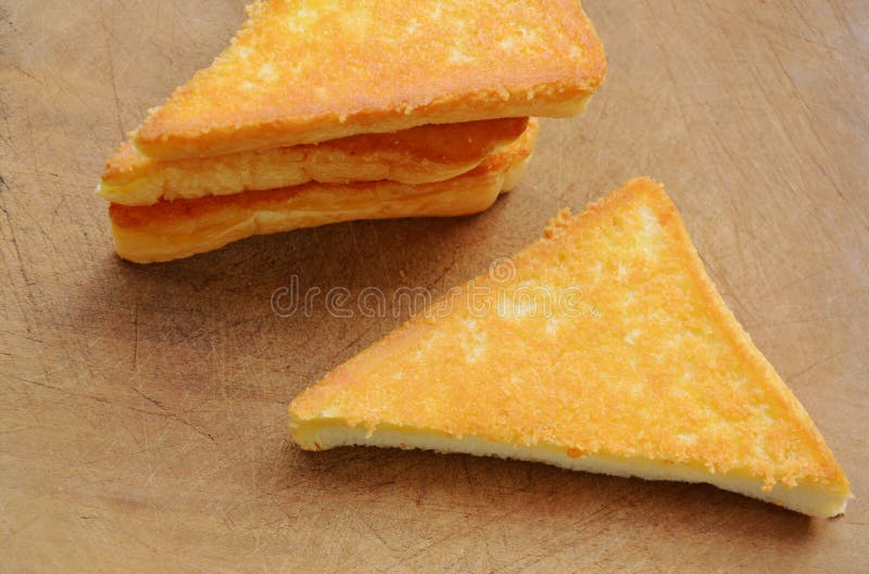 Baked Butter Bread Slice on Chopblock Stock Photo - Image of dairy ...