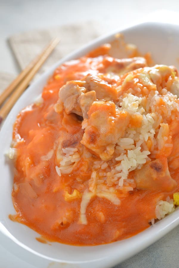 Baked cheese chicken rice stock image. Image of sauce - 70346305