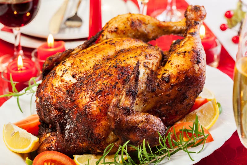 Baked Chicken for Christmas Dinner Stock Photo - Image of glass, plate ...