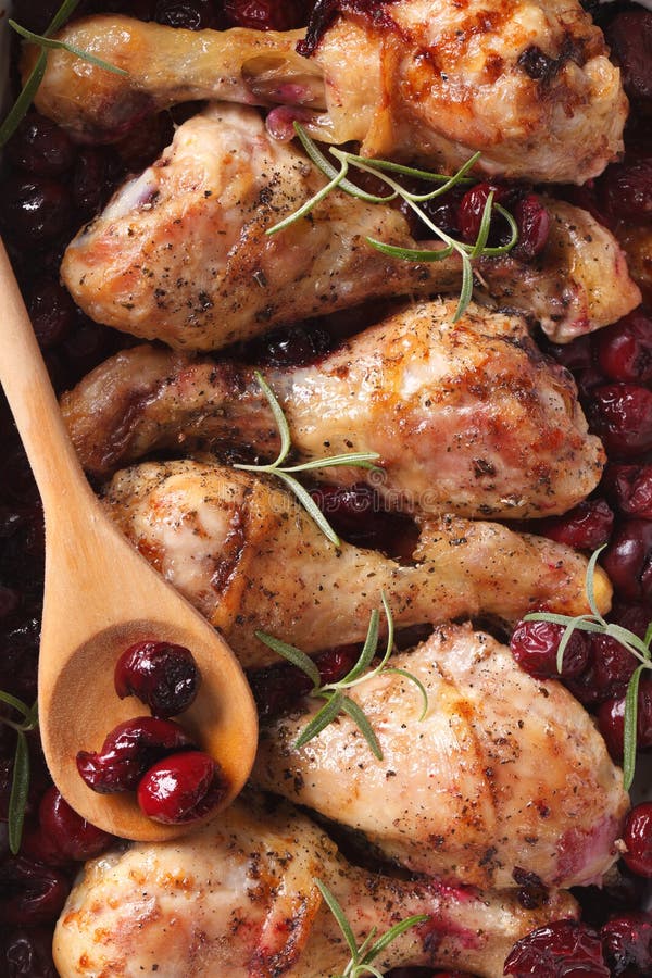 Baked Chicken Leg with Cherry Macro. Vertical Top View Stock Photo ...