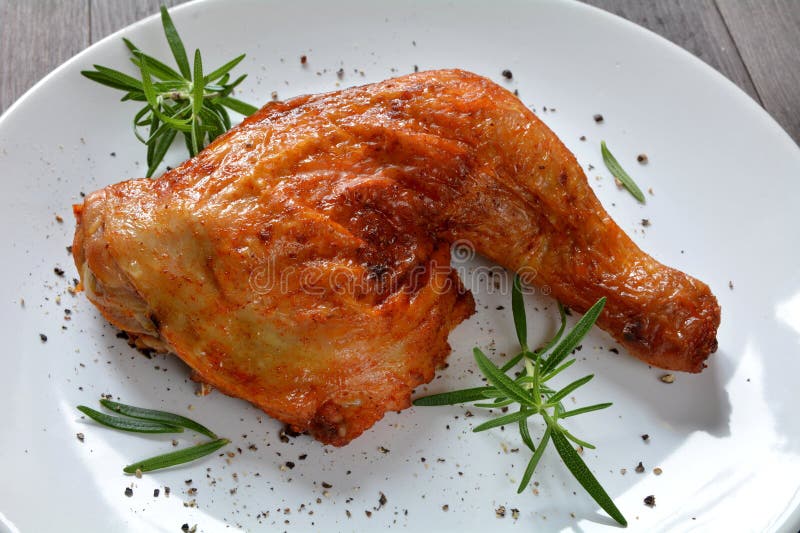 Baked chicken leg stock photo. Image of poultry, dish - 305941742