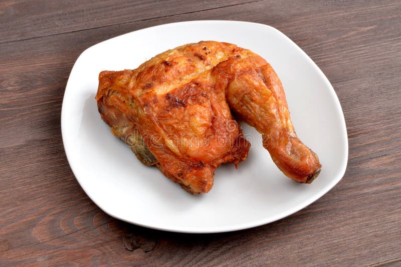 Baked chicken leg stock photo. Image of meal, poultry - 305942856