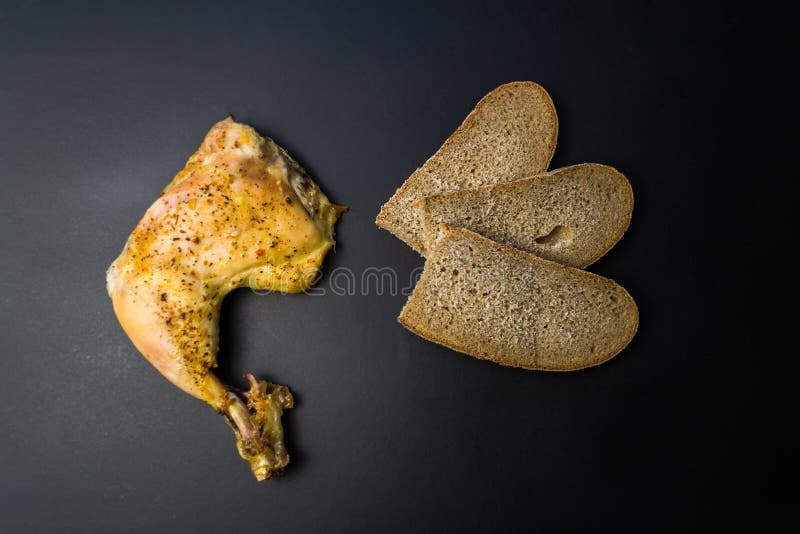 Baked Chicken Leg and Three Slices of Rye Bread Stock Image - Image of ...