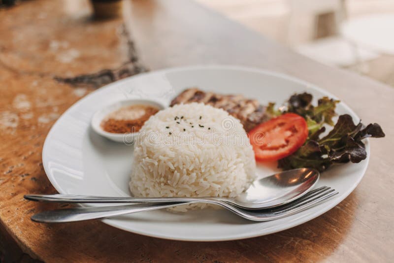 Baked Chicken with White Rice Served on the Table. Stock Image - Image ...