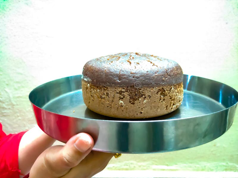 Baked Chocolate Cake in Human Hand. Raw Cake without Decoration. Brown ...