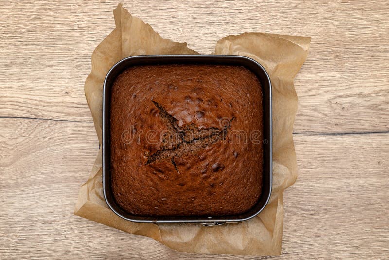 Baked Cocoa Cake Lying on a Square Baking Tray. Stock Image - Image of ...