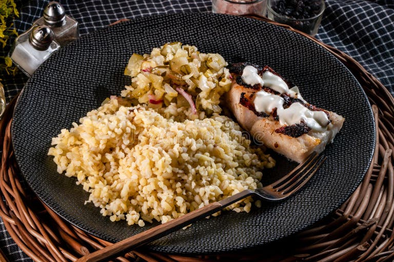 Roasted Cod Fish with Bulgur Stock Photo - Image of cuisine, cucumber ...