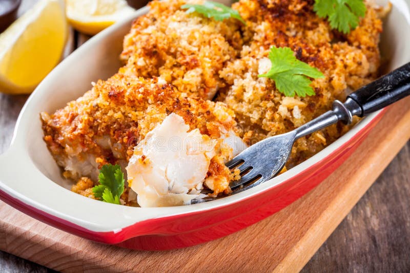 Baked Cod Fish in Breadcrumbs in Gratin Dish Closeup Stock Image ...