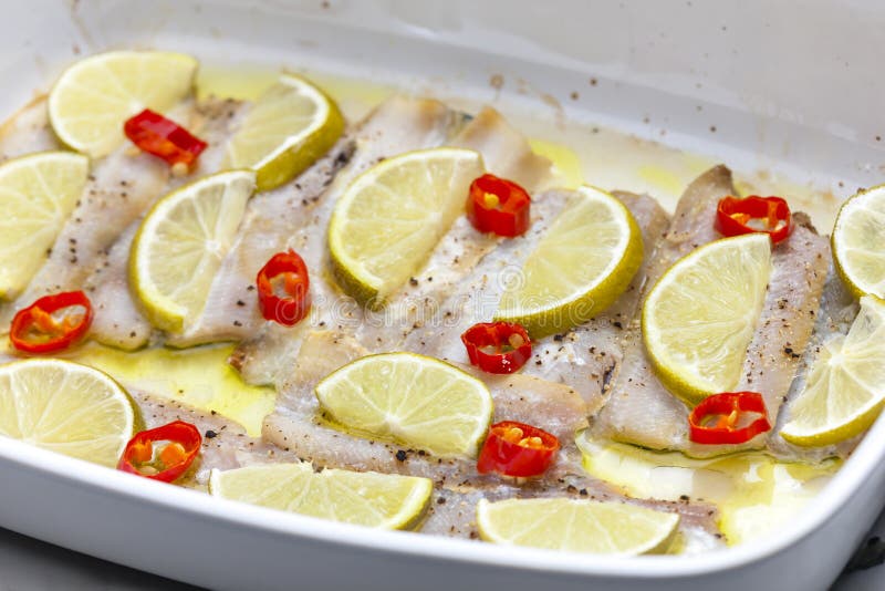 Baked Cod Fish with Lemon and Chilli Stock Image - Image of prepared ...