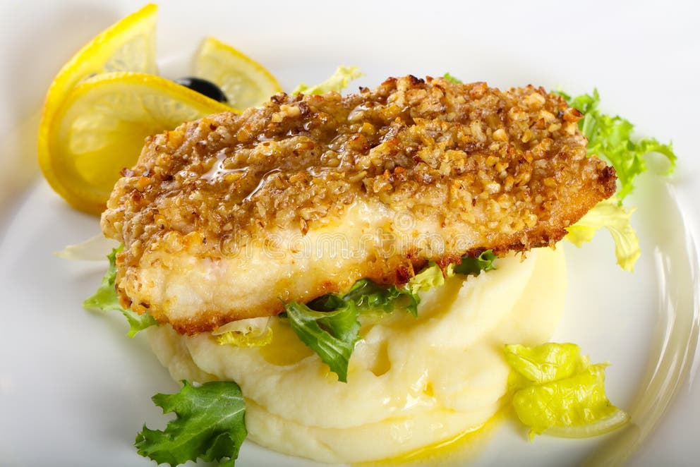 Cod Fish with Mashed Potato Stock Photo - Image of lemon, potatoes ...