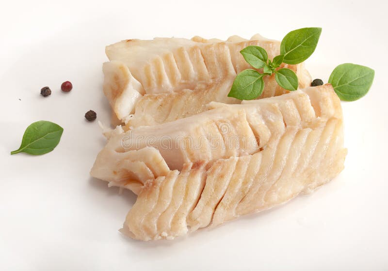 Baked cod loin with basil stock image. Image of dish - 150445365