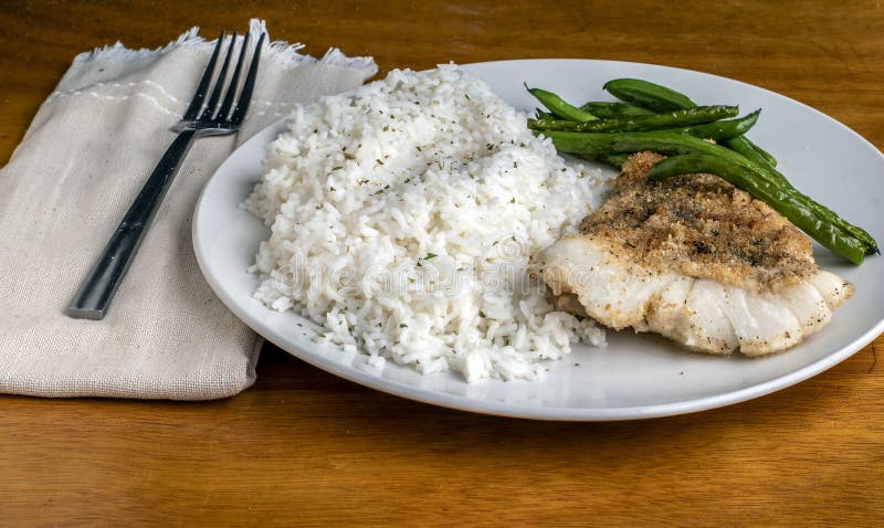 Baked Cod with Sauteed Green Beans and Rice Stock Image - Image of ...