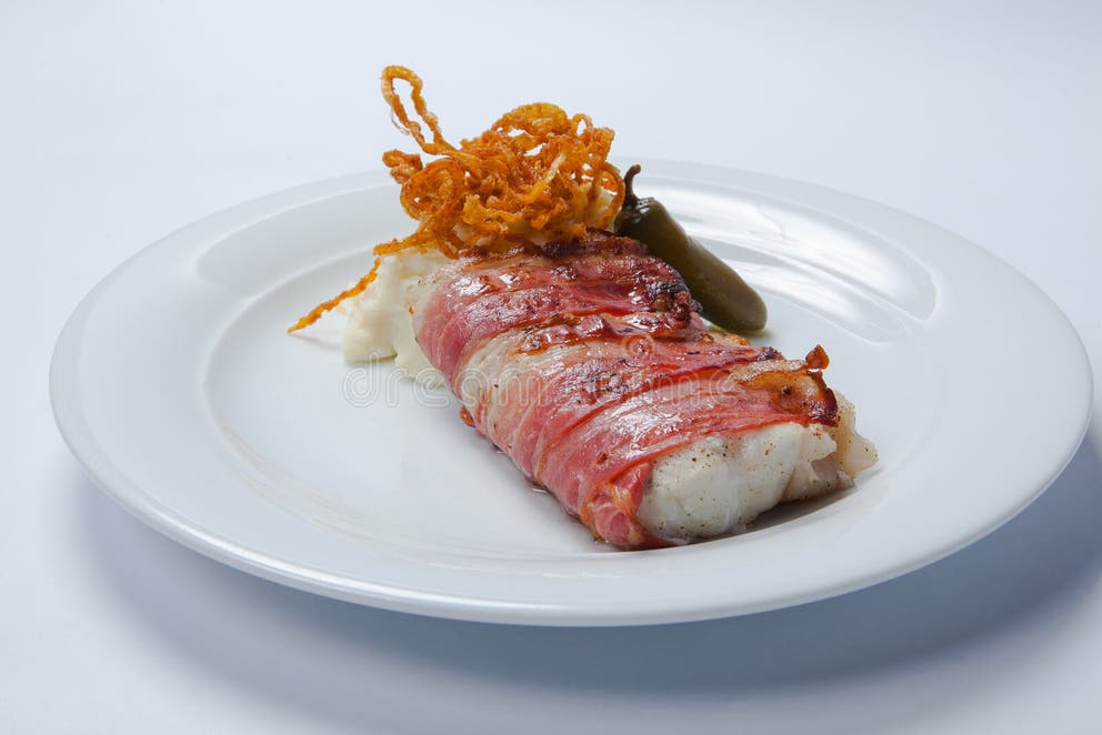 Baked Cod Wrapped in Bacon and Mashed Poatoes Stock Image - Image of ...