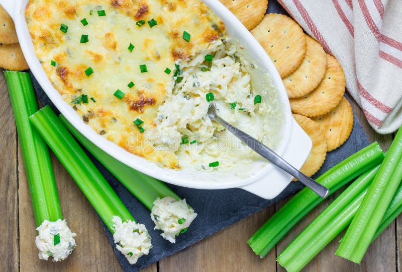 Baked crab dip, top view stock photo. Image of green - 66281538