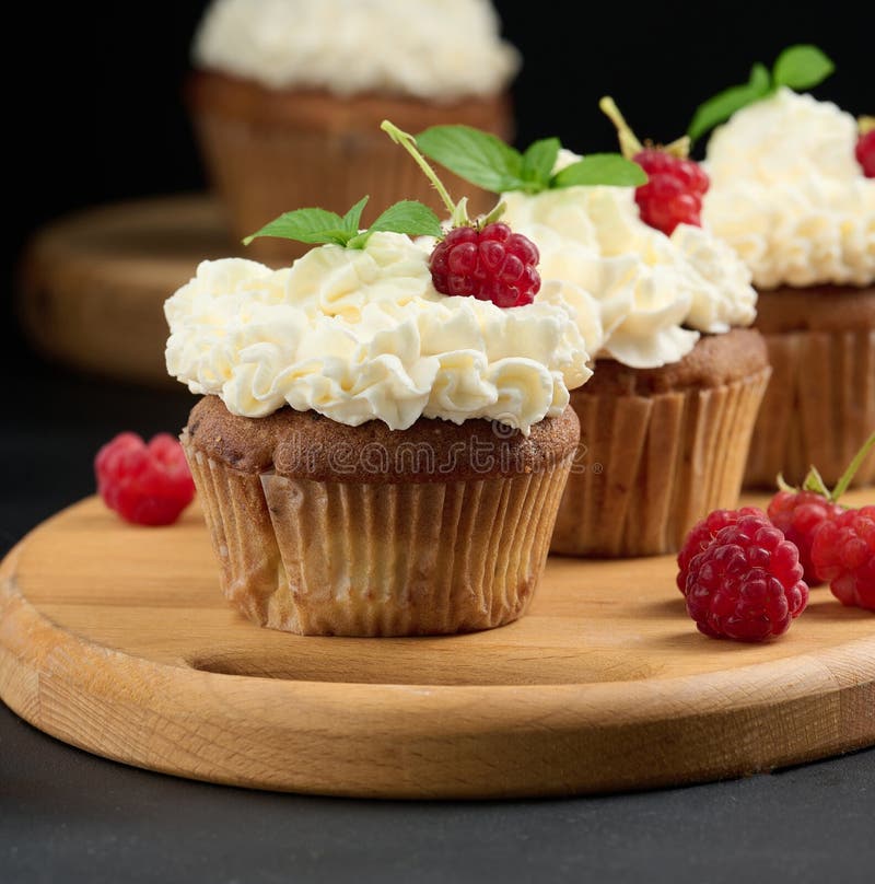 Baked Cupcakes with White Cream on the Table, Delicious Dessert Stock ...