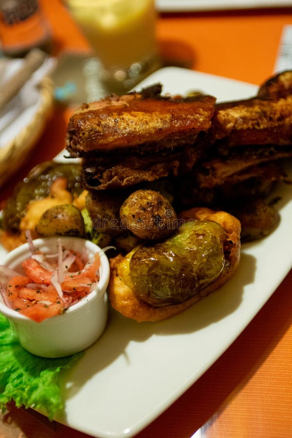 Baked cuy served stock image. Image of portrait, food - 270927297