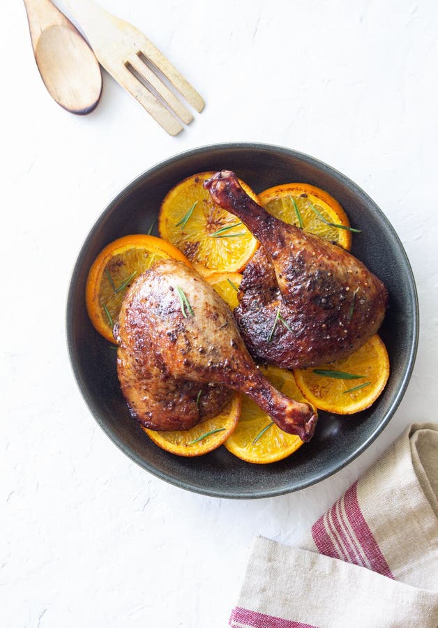 Baked Duck Legs with Oranges and Rosemary. Rustic Style Stock Image ...