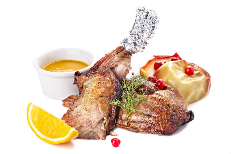 Baked Duck Meat with an Apple, a Slice of Lemon. Stock Photo - Image of ...