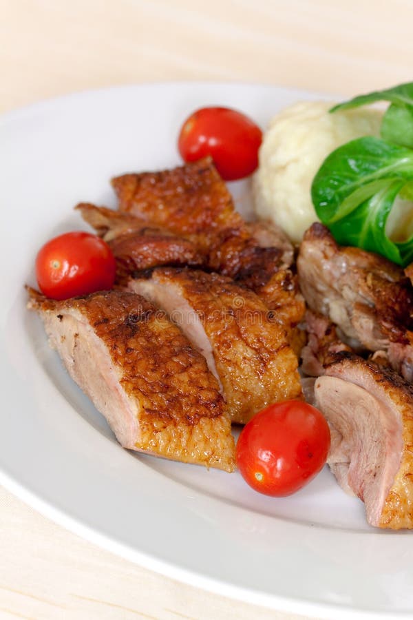 Baked Duck Slices with Dumplings,Cherry Tomatoes,G Stock Image - Image ...