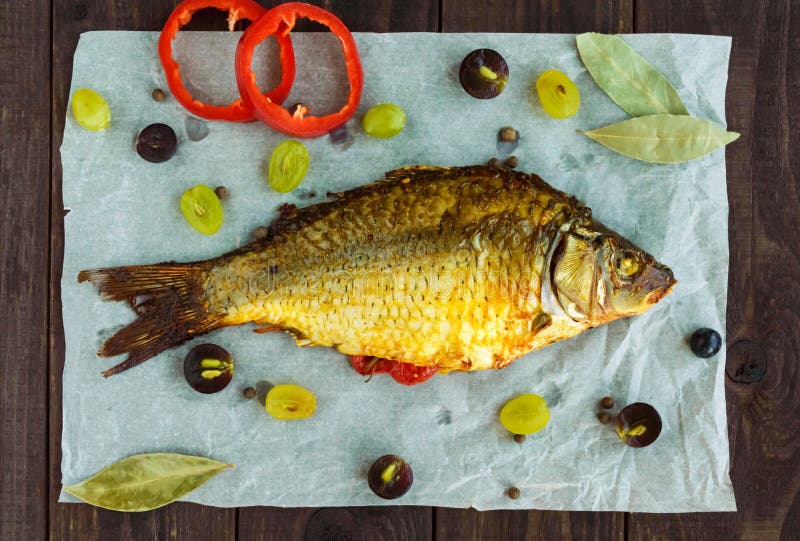 Baked Fish Carp, Stuffed Bell Peppers and Grapes Stock Image - Image of ...