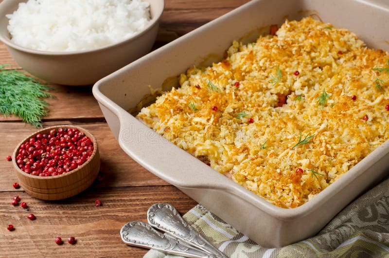 Baked Fish Fillet with Carrots Under a Bread Crust Stock Image - Image ...