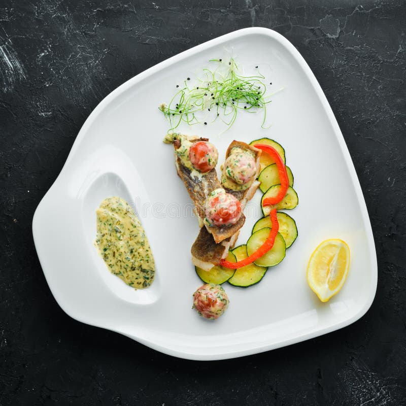 Baked Fish Fillet with Vegetables. Top View Stock Photo - Image of ...