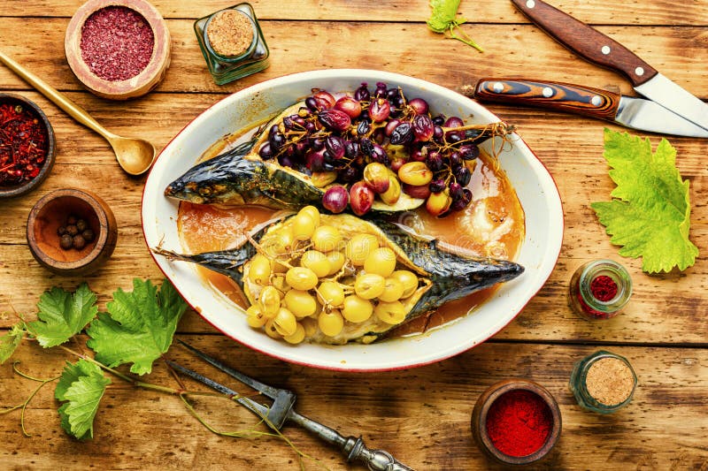 Baked Fish with Grape Sauce Stock Photo - Image of rural, flat: 219262630