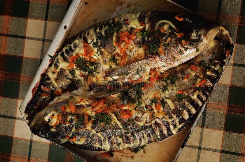 Baked fish on the griddle stock image. Image of fish, griddle - 2999185