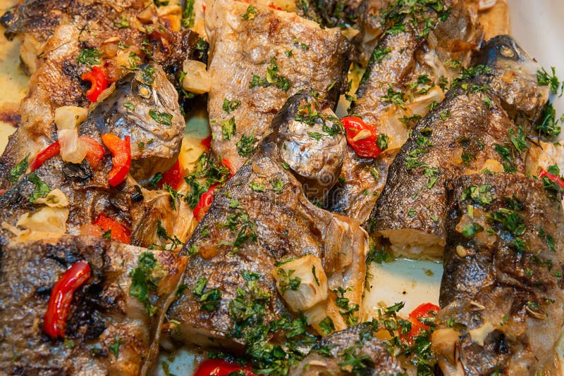 Baked fish hake on plate stock image. Image of pepper - 179631805