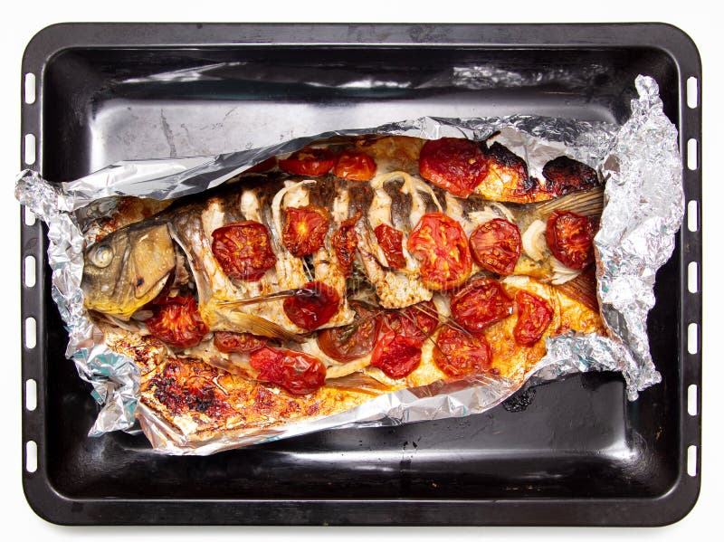 Baked Fish in the Oven with Tomatoes Stock Photo - Image of pepper ...