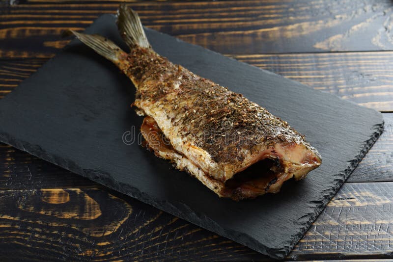 Baked Fish on the Table. Baked Carp Stock Photo - Image of dinner ...